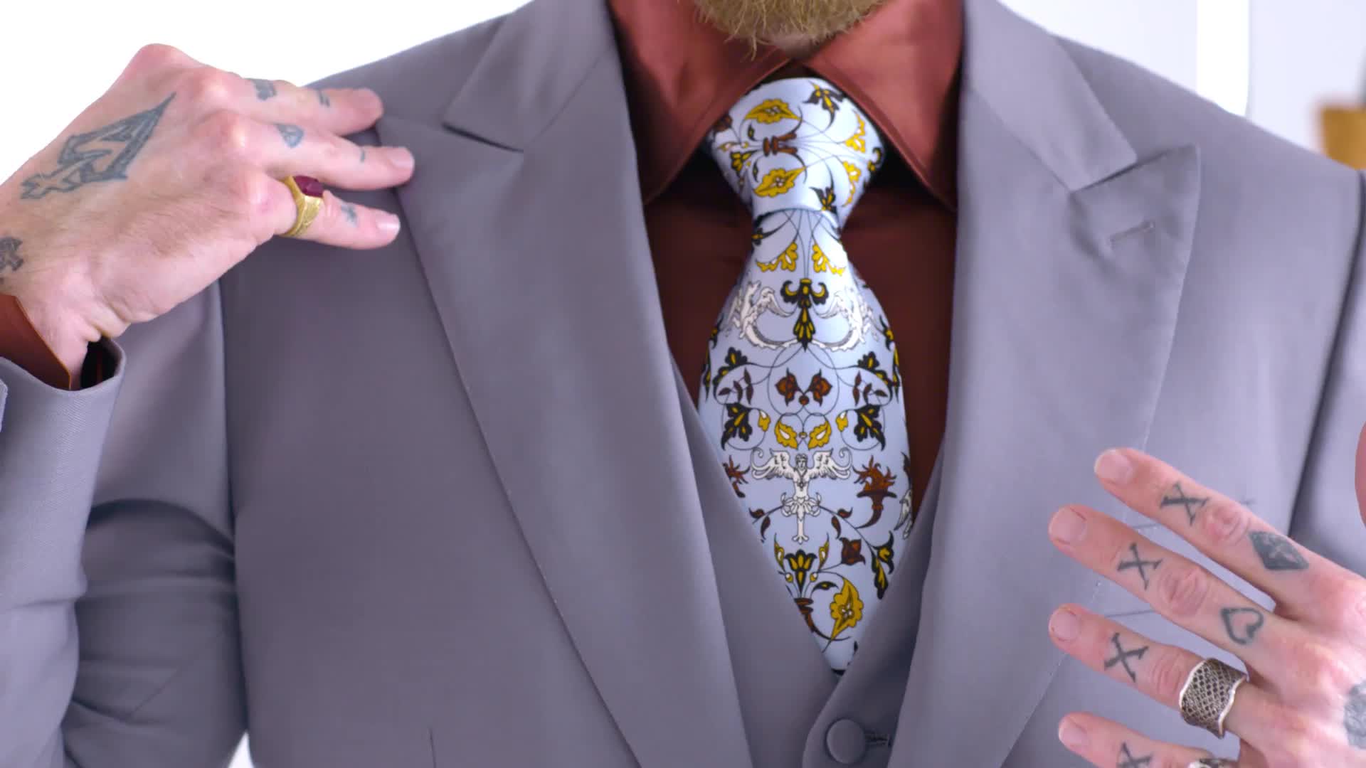 Watch How To Wear a Suit Like a Real Rock 'n' Roller | GQ