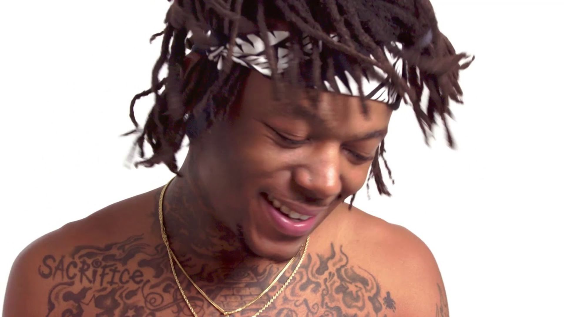 Watch J.I.D. on the Tattoo He Got When He Was Barely a Teenager | GQ India