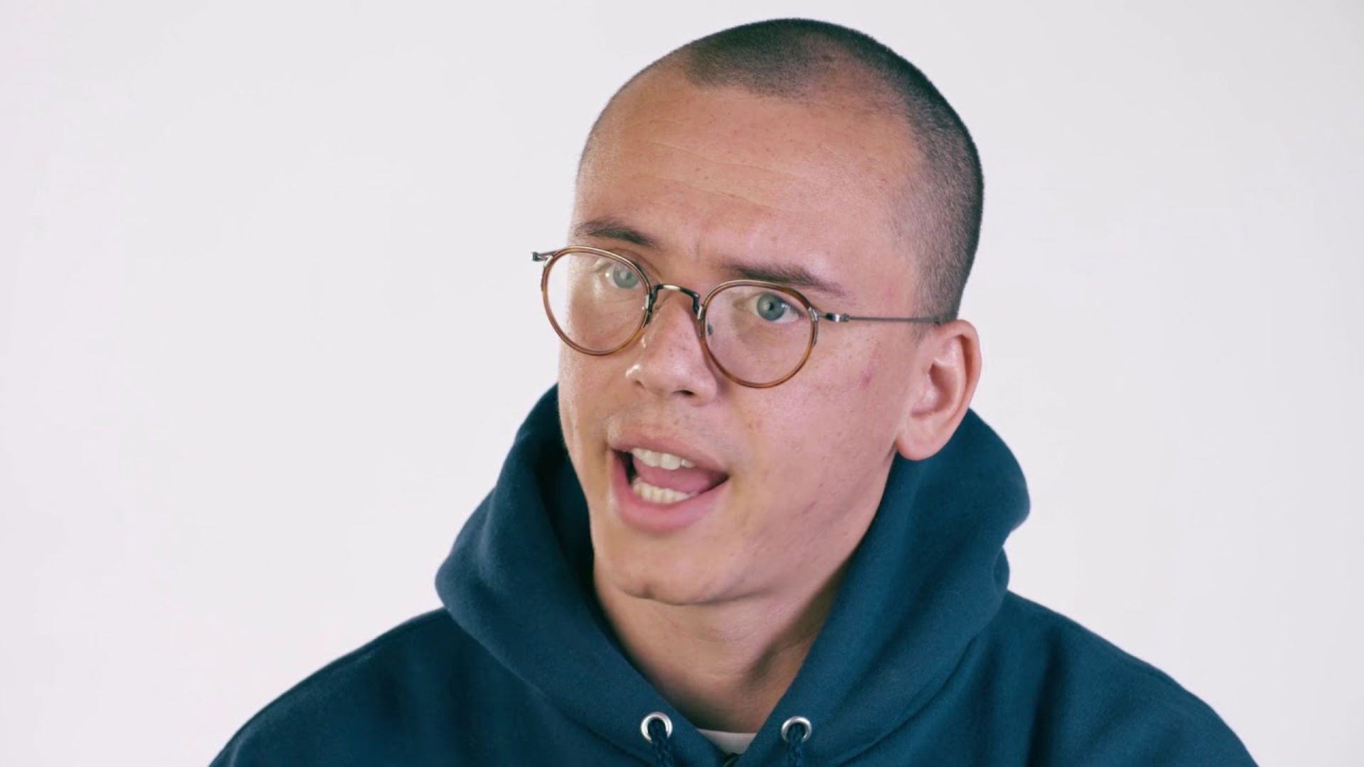 Watch Logic Flaunts His Latest Tattoos | GQ India