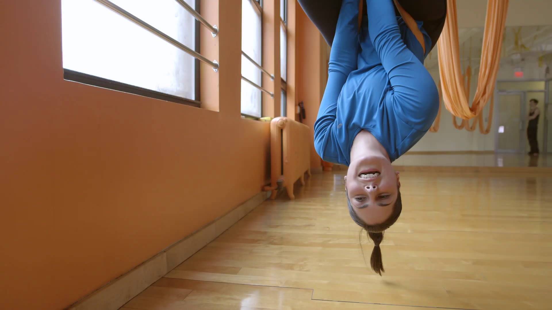 Watch Laura Prangley vs. Aerial Yoga | Girl vs. Sweat | SELF