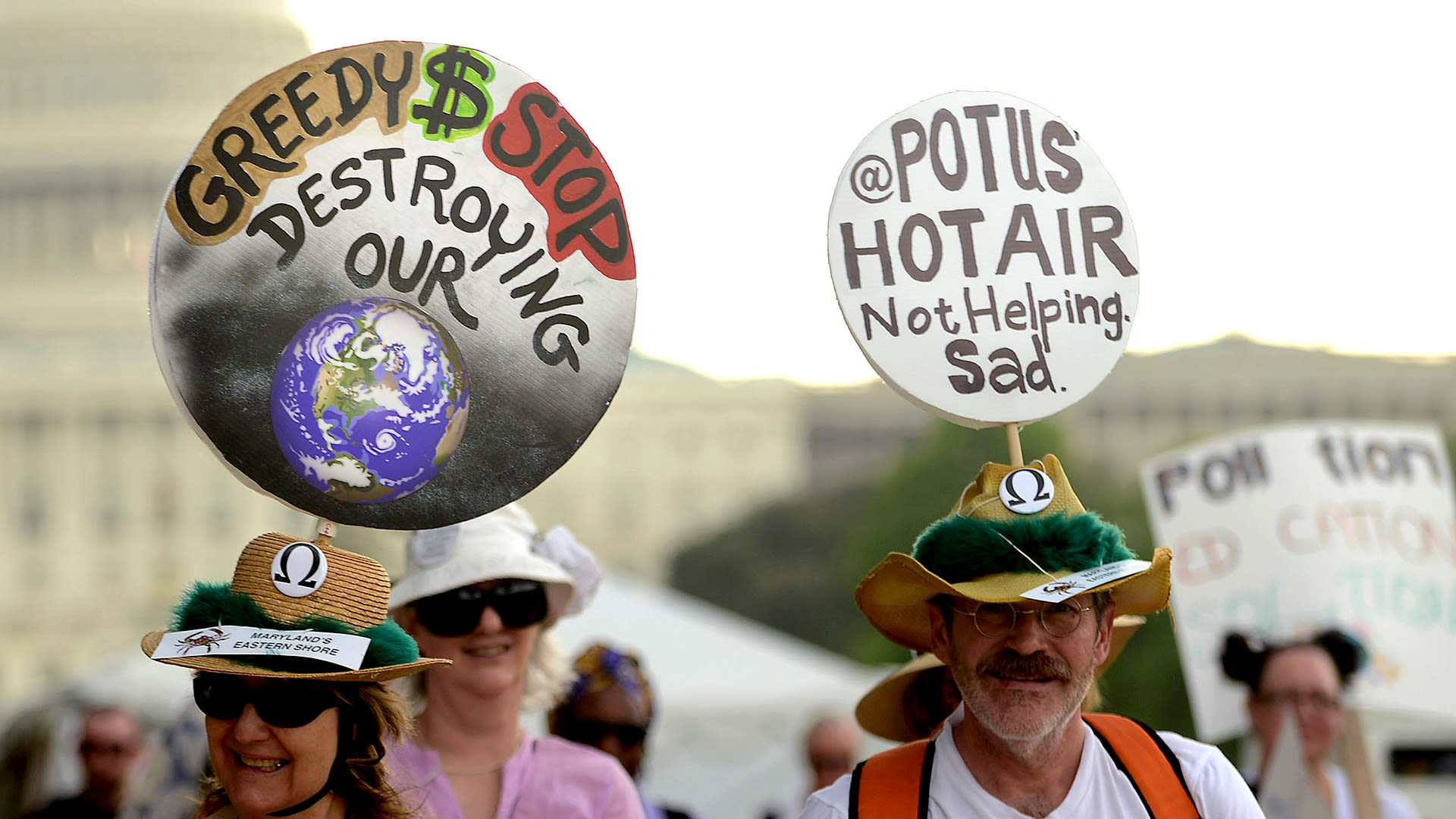 Watch The Best Signs From the Climate Change March | Teen Vogue