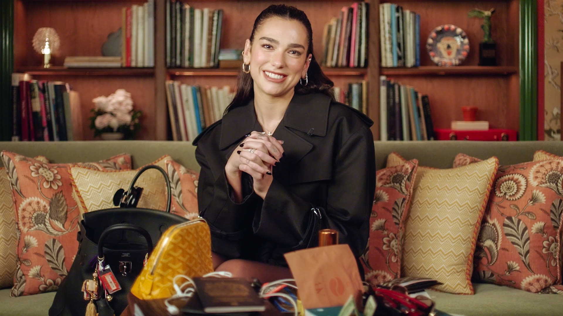 Watch Books, Hot Sauce, and Tangled Headphones: Inside Dua Lipa’s ...