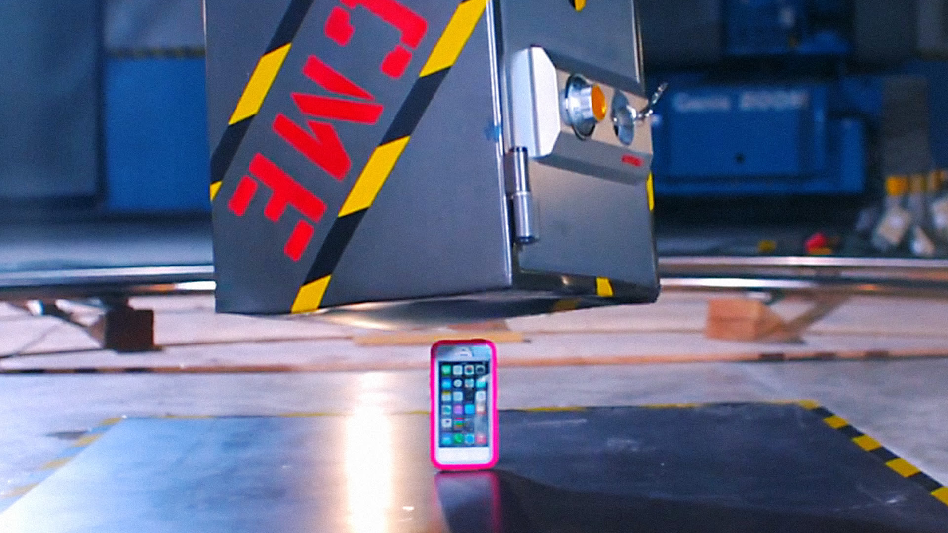 Watch 50-pound Safe Folds iPhone in Half | Battle Damage | WIRED